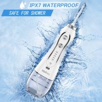 China 2500mAh Ultrasonic Teeth Cleaner 5 Modes Handheld Water Flosser Portable Oral Irrigator for sale