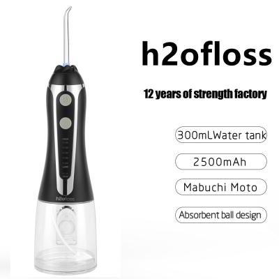 China Cordless Rechargeable Ultrasonic Water Flosser 300ml IPX7 2500mAh Dental Irrigator for sale