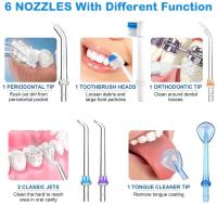 China Commercial Portable Water Flosser with 2500mAh Battery and 300ml Tank - 5 Pressure Modes for Professional Dental Care for sale