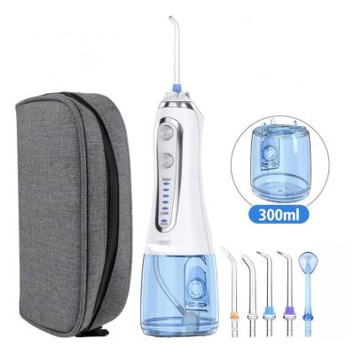 China Electric Water Flosser 5 Modes 1400 Pulses/min Portable Oral Irrigator for Home Travel Braces Care for sale