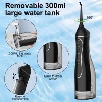 China Portable Electric Water Flosser with 300ML Tank, 4 Cleaning Modes and 2000mAh Rechargeable Battery for sale