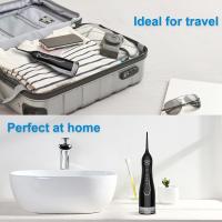China Cordless Water Flosser 300ML IPX7 Waterproof Oral Irrigator with 4 Jet Tips and 1200-1400 PPM for sale