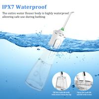 China Portable Dental Water Flosser 300ml Rechargeable Oral Irrigator 5 Modes IPX7 Waterproof for sale
