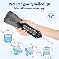 China Custom Dental Water Flosser with UV Sterilization 300ML Tank IPX7 Waterproof USB Charging 40-110PSI for sale