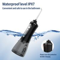 China Portable Dental Irrigator 300ML Water Tank 2500mAh Lithium Battery Teeth Cleaner for sale