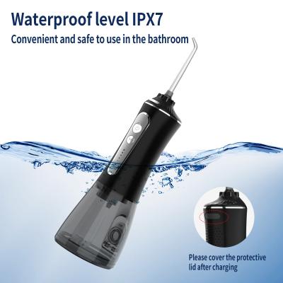 China Portable Dental Irrigator 300ML Water Tank 2500mAh Lithium Battery Teeth Cleaner for sale