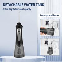China Portable Dental Irrigator 300ML Water Tank 2500mAh Lithium Battery Teeth Cleaner for sale
