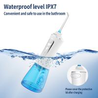 China IPX7 Waterproof Electric Dental Flosser 1200-1400 Pulse Frequency 300ML Tank for sale