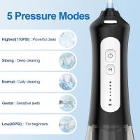 China Portable Waterproof IPX7 Electric Oral Irrigator with 300ML Tank and 1200-1400 Pulse Frequency for sale