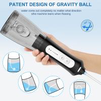 China Portable Waterproof IPX7 Electric Oral Irrigator with 300ML Tank and 1200-1400 Pulse Frequency for sale