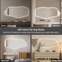 China Dimming Customizable Backlit Vanity Mirror Wave Edge Wall-Mounted LED Bathroom Mirror Anti-Fog 60x80cm for sale