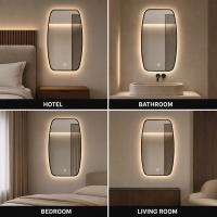 China Organic Oblong Curved LED Mirror with Dimmable Backlight and IP44 Waterproof Copper-free Silver Glass for sale