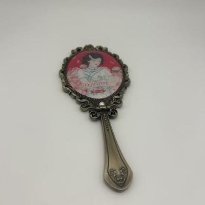 China Magnet small size folding cosmetic mirror made of zinc alloy with customizable plating colors and OEM options suitable for gifts for sale