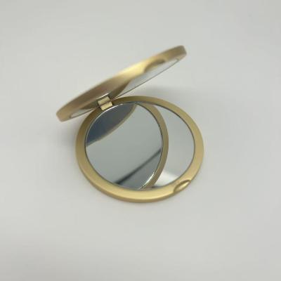 China Magnet small size folding makeup mirror, Metal cosmetic mirror for sale for sale