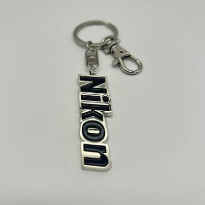 China Alphanumeric metal keyrings soft enamel crafts  letters keychains custom for sale