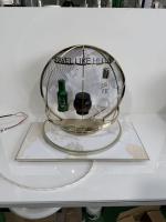 China Globe-shaped Acrylic POS Display with Polished Gold Metal Frame and Built-in LED Backlighting for Luxury Skincare Retail for sale