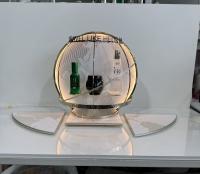 China Globe-shaped Acrylic POS Display with Polished Gold Metal Frame and Built-in LED Backlighting for Luxury Skincare Retail for sale