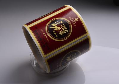 China Custom printing glossy varnishing self adhesive special paper chinese wine bottle labels roll for sale