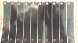 China Shiny Black PET Die Cut Mylar Thin Two Small Hole Flexible Long Strip for sale