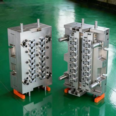 China 16 Cavity Plastic Injection Mold Silicone Dust Protective   Injection Plastic Parts for sale