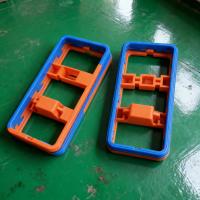 China Custom Double Color 2K Injection Molding Parts OEM Plastic Overmolding Frame Housing Manufacturer for sale
