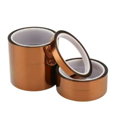 China Amber Polyimide Film Adhesive Tape with 33m Standard Roll Length and ≥2.0KV BDV for High Temperature Applications for sale