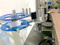 China Automatic Economical, Self Contained Labeling System With A Variable Speed Conveyor. for sale