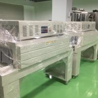 China Semi-Automatic Heat Seal Shrink Wrap Tunnel Packaging Shrink Wrapping Machine for sale