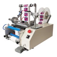 China Cosmetic Food Juice Manual Bottle Labeler Semi Auto Label Roller Machine In Small Workshop for sale