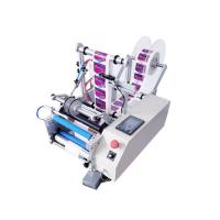 China Cosmetic Food Juice Manual Bottle Labeler Semi Auto Label Roller Machine In Small Workshop for sale