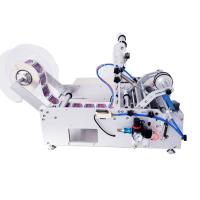 China Cosmetic Food Juice Manual Bottle Labeler Semi Auto Label Roller Machine In Small Workshop for sale