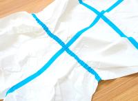 China Taped Body Protection Surgical Hazmat Suit Asbestos Removal Waterproof Disposable Coverall for sale