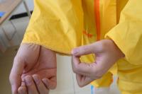 China CE Type 3 Oily Gas Chemical Resistant Overalls Yellow Non Woven Disposable Coverall for sale