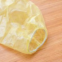 China Non Woven PP PE Coated Yellow Disposable Isolation Gown Surgical For Hospital for sale