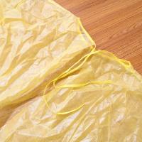 China Non Woven PP PE Coated Yellow Disposable Isolation Gown Surgical For Hospital for sale