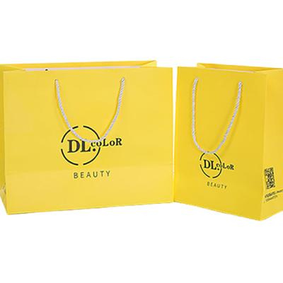 China Recycled Materials Custom Paper Bags With Your Own Logo Kraft Paper Suitcase With Handle for sale