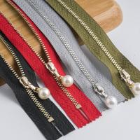China Brass Metal Zipper With Pearl Slider #5 Open-End For Clothes for sale