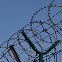 China Galvanized and Powder Coated Barbed Wire Fence for Outdoor Perimeter Protection for sale