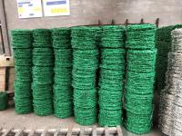 China 12x14 Green PVC Coated Barb Wire Roll Concertina Wire Mesh High Strength for sale