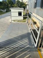 China 46s Lifting Time Loading Dock Table Hydraulic Scissor Lift Table with Handrail and Chain Carrying Capacity 2000kg Safe for sale