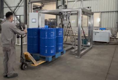 China High Capacity Automatic Liquid Pallet Filling Machine With Cognex Camera Suitable For 200L Drum And IBC for sale