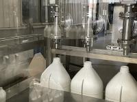 China 1-4L Fully Automatic 4 Nozzle Explosion Proof Chemical Liquid Filling Machine for Jerrycan Pail Can for sale