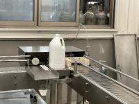 China 1-4L Fully Automatic 4 Nozzle Explosion Proof Chemical Liquid Filling Machine for Jerrycan Pail Can for sale