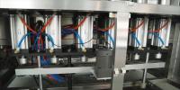 China Piston Filling Machine 100-2000ml for Tomato Sauce Honey Peanut Butter Semi-Liquid Paste 30-50 BPM for sale