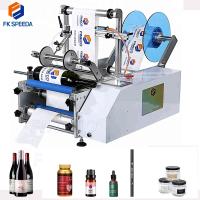 China Semi Automatic Round Bottle Adhesive Sticker Labeling Machine for Wrap Around Labeling for sale