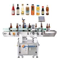 China Electric Driven Automatic Labeling Machine for Round Bottles of Plastic Wine and Beer for sale
