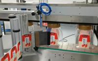 China Automatic Double Side Labeling Machine FK911 40-120pcs/min for Flat Round Square Bottles for sale