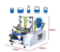 China Semi Automatic Round Bottle Labeling Machine for Wrap Around Labeling of Honey Jam Jar for sale