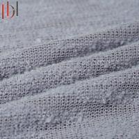 China Hot Garment Bag Polar Textile Woven Upholstery Skin Friendly Coral Fleece Fabric for sale