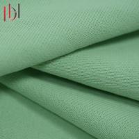China 100% Cotton Fabric Green French Sheepskin Premium Cotton Material Winter Spring Sportswear Cotton Hoodie Fabric for sale